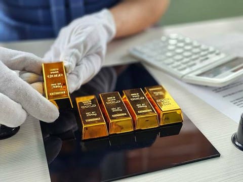 Goldman Sachs cuts year-end gold forecast by $500 on fading Fed rate ...