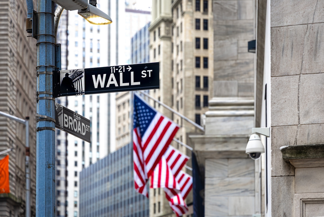 Wall Street ended mostly lower after a volatile trading session ...